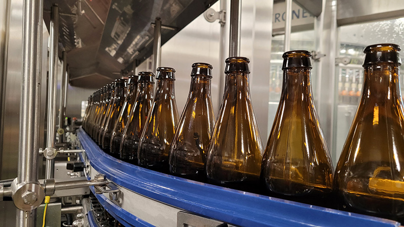 Domino brews up high-speed laser coding for beer bottles | Packaging ...